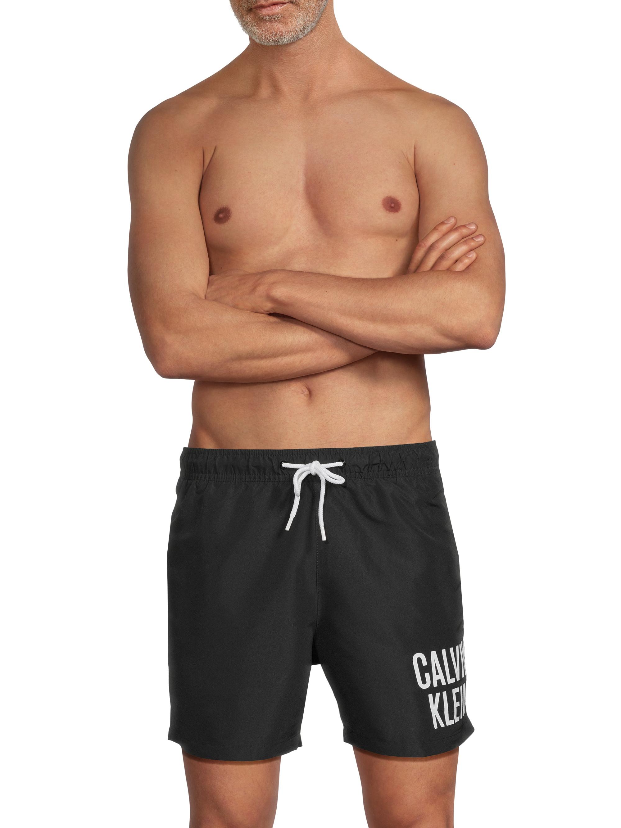 Click here for Calvin Klein Mens Logo-Print Drawstring Swim Short... prices