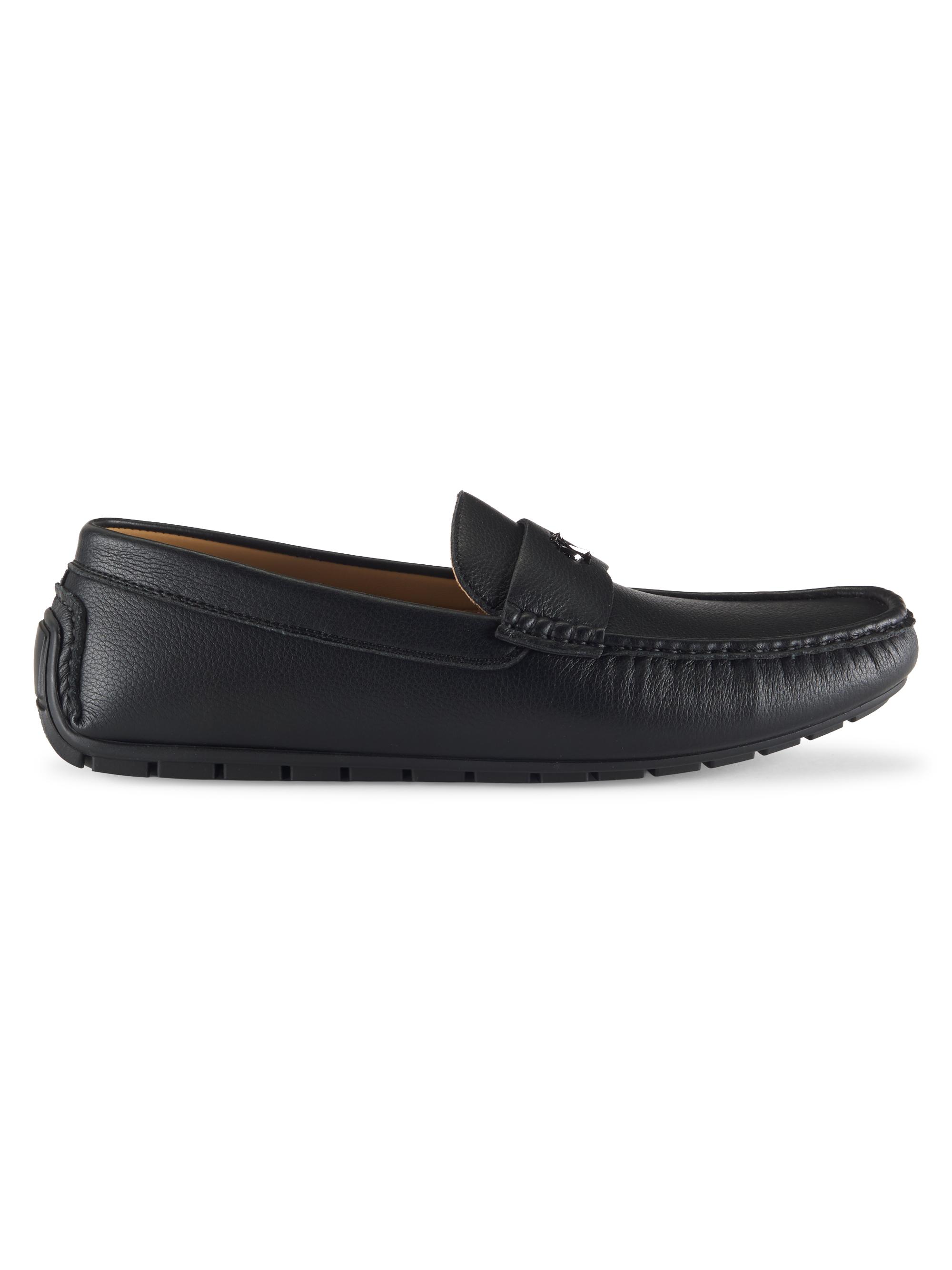 Click here for Calvin Klein Mens Follman Slip-On Casual Loafers -... prices