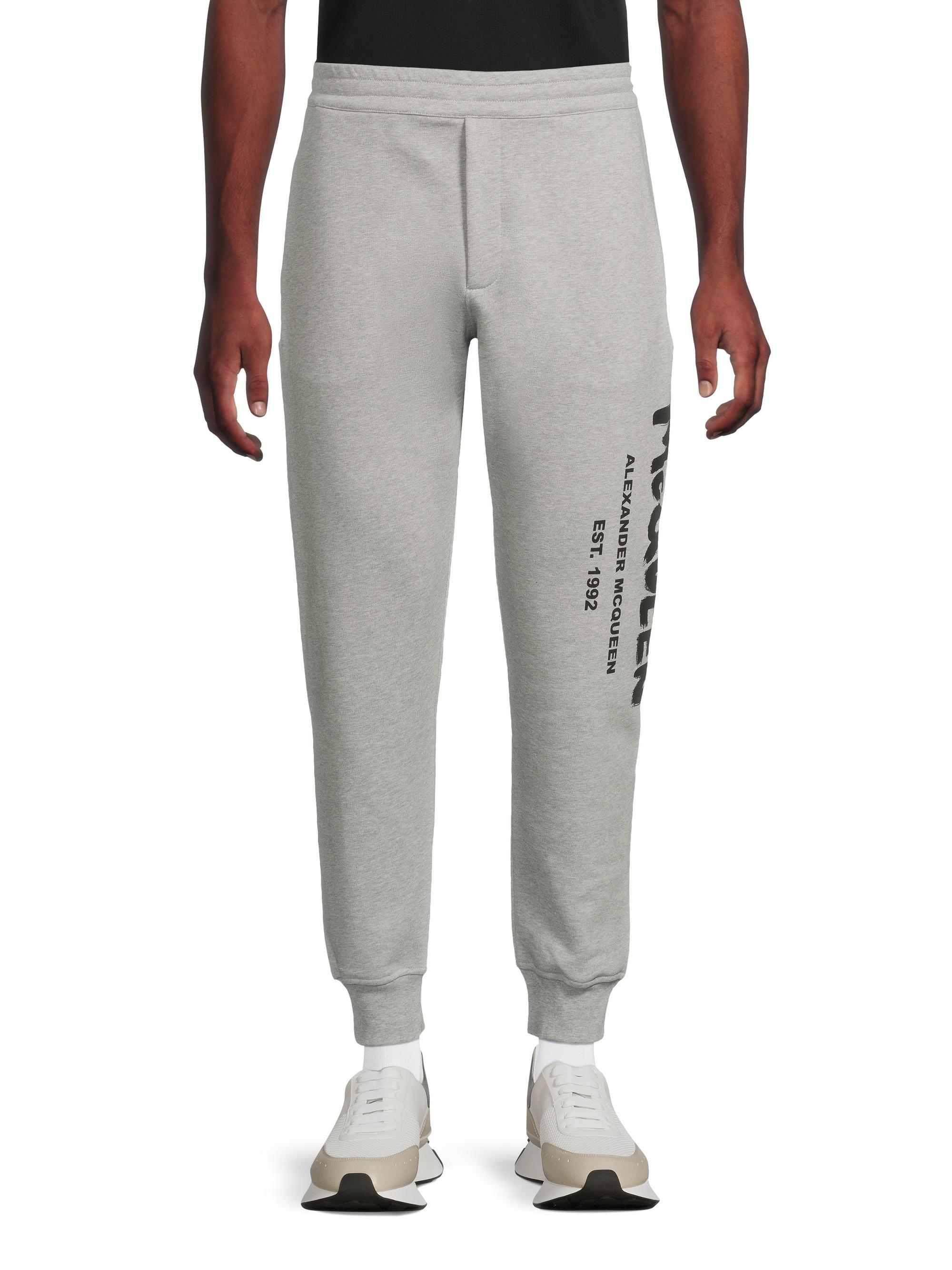 Click here for Mcqueen Mens Graffiti Logo Cotton Joggers - Pale G... prices