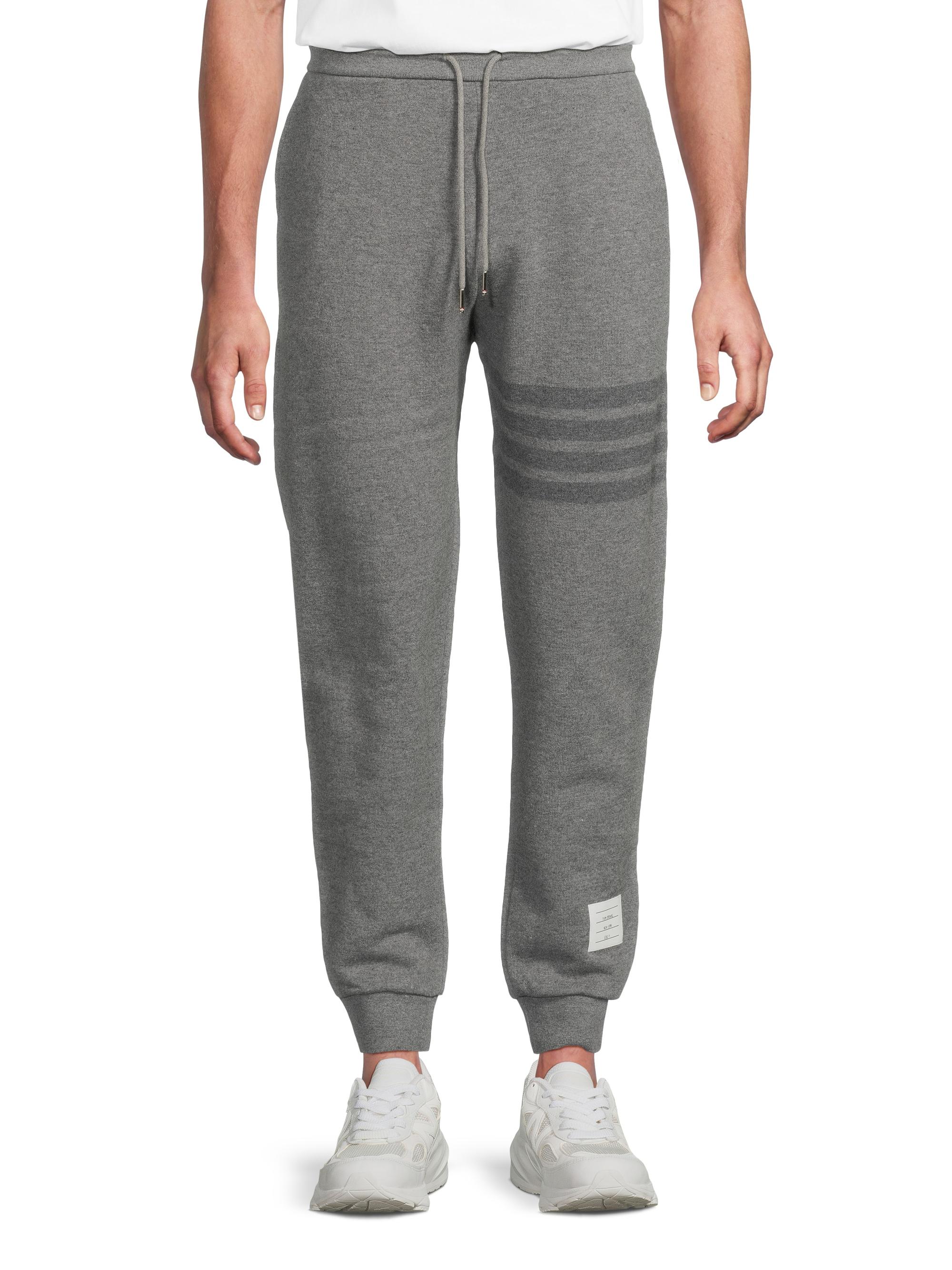Click here for Thom Browne Mens Logo Striped Virgin Wool Sweatpan... prices