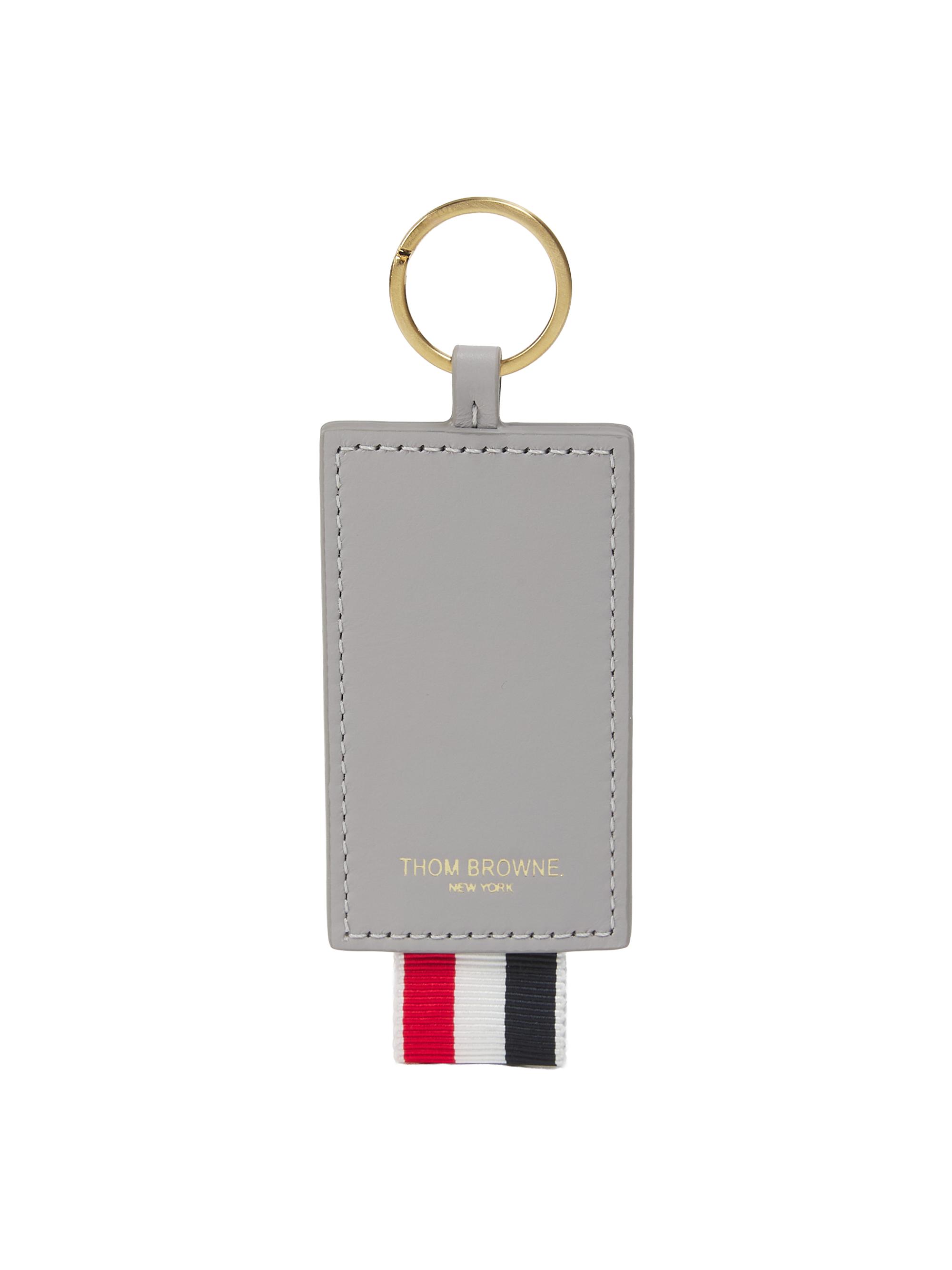 Click here for Thom Browne Mens Rectangular Keychain - Light Grey prices