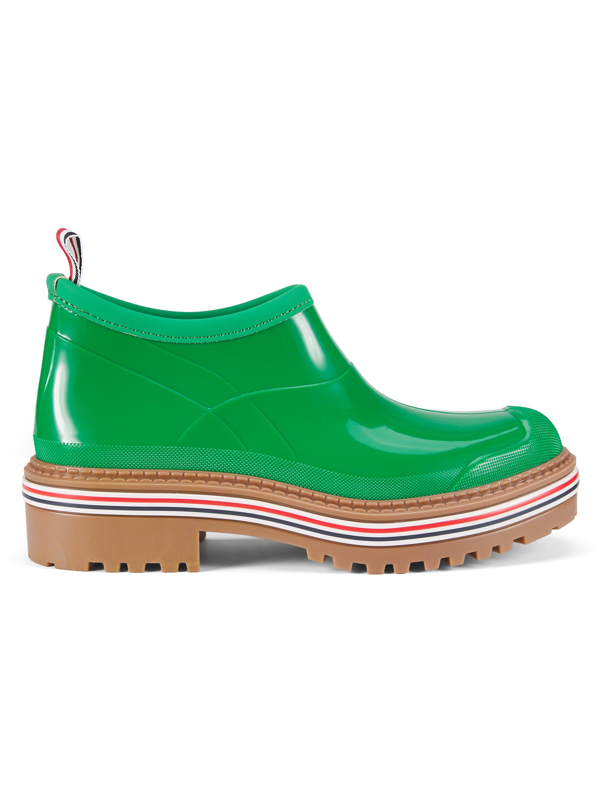 Click here for Thom Browne Womens 40MM Glossy Rain Boots - Light... prices